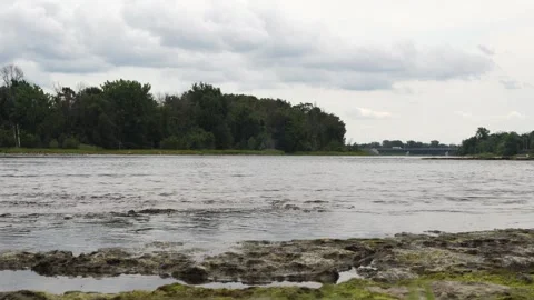 The water of a river flowing freely with... | Stock Video | Pond5