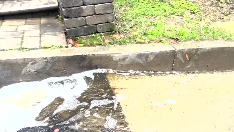 water rushing out of storm drains | Stock Video | Pond5