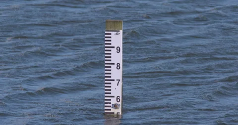 Water sea level measuring stick submerge... | Stock Video | Pond5