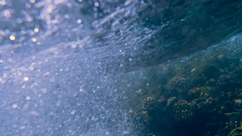 Water splash and lens flares in Red Sea ... | Stock Video | Pond5