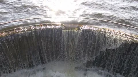 water splash in lake dam construction | Stock Video | Pond5
