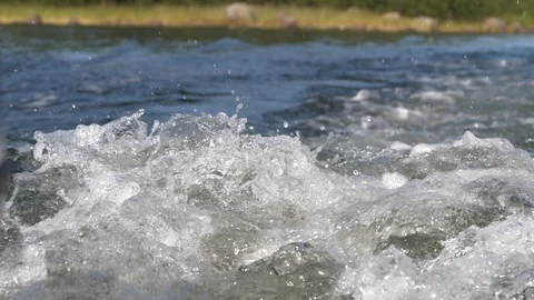water splashing behind motor boat in roc... | Stock Video | Pond5