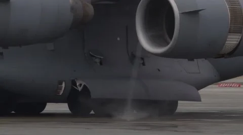Water spout sucked into a jet engine of ... | Stock Video | Pond5