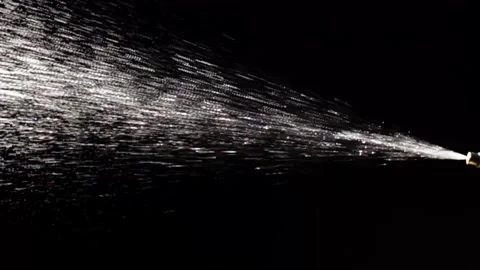 Water spray dust. Spraying mist effect w... | Stock Video | Pond5