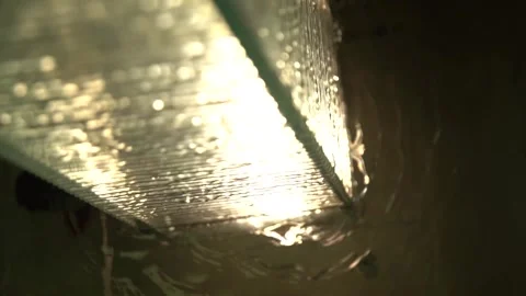 Water streaming down on semi-transparent... | Stock Video | Pond5