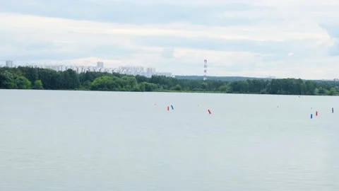 Water surface of big river with city bac... | Stock Video | Pond5