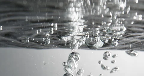 Water Surface With Bubbles Rising And Fo... | Stock Video | Pond5