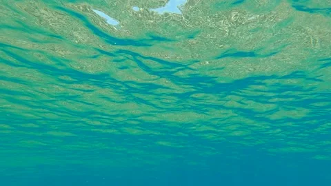 On water surface reflection from the san... | Stock Video | Pond5