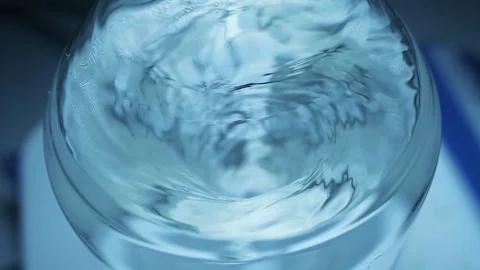 water vortex formed in beaker. magnetic ... | Stock Video | Pond5