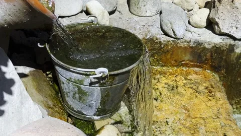 Waterfall flowing from Pot to Bucket | Stock Video | Pond5