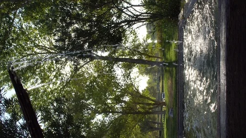 Waterfall fountain dripping water into p... | Stock Video | Pond5