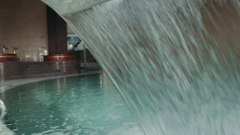 Waterfall jet in swimming pool. Fountain... | Stock Video | Pond5