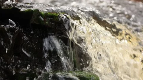Waterfall water flowing in slow motion | Stock Video | Pond5