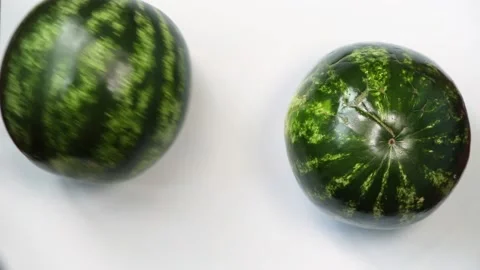 Watermelons spinning and coming to the f... | Stock Video | Pond5