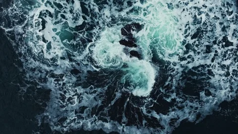 Waters of the ocean, swirl around the ro... | Stock Video | Pond5