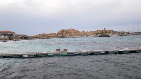 waves in the port of L'Ile-Rousse with T... | Stock Video | Pond5