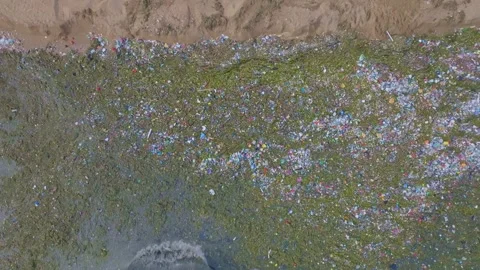 Waves spill garbage, plastic pollution w... | Stock Video | Pond5