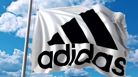 Waving flag with Adidas logo against mov... | Stock Video | Pond5
