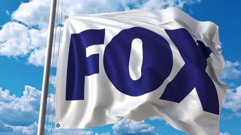 Waving flag with Fox logo against moving... | Stock Video | Pond5