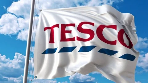 Waving flag with Tesco logo against movi... | Stock Video | Pond5