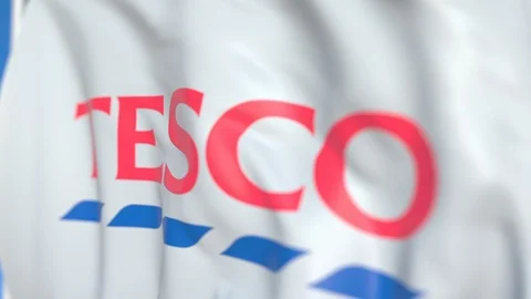 Waving flag with Tesco plc logo, close-u... | Stock Video | Pond5