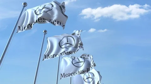 Waving flags with Mercedes-Benz logo aga... | Stock Video | Pond5