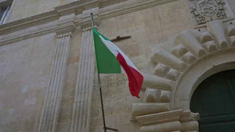 Waving italian flag mounted on an ancien... | Stock Video | Pond5