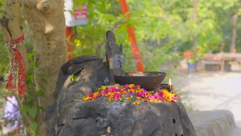 On the way, the idol of Shani Dev with b... | Stock Video | Pond5