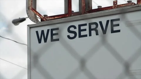 we serve caption text writing billboard ... | Stock Video | Pond5