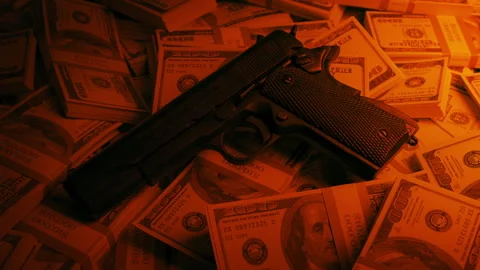 Weapons Business Concept - Gun On Cash P... | Stock Video | Pond5