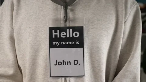 Wearing a HELLO MY NAME IS Indentificati... | Stock Video | Pond5