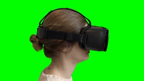 Wearing Virtual Reality Headset On Green... | Stock Video | Pond5