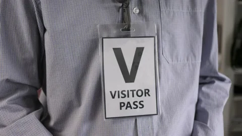Wearing a Visitor Pass Indentification B... | Stock Video | Pond5