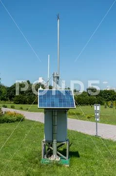Weather station with solar panels shows weather forecast ~ Premium ...