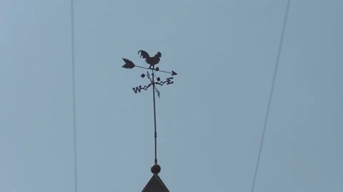 Weather vane on roof of the house. Weath... | Stock Video | Pond5