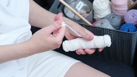 Weaving macrame at home. Hand of a woman... | Stock Video | Pond5
