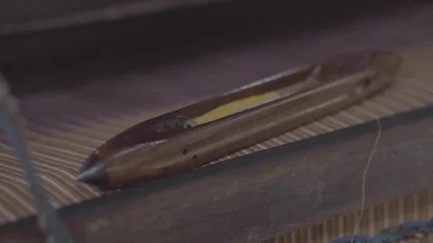 Weaving shuttle on the traditional weavi... | Stock Video | Pond5