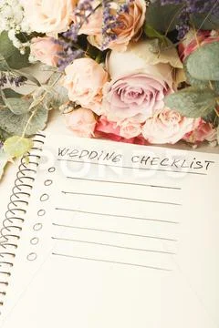Wedding checklist and rose bouquet ~ Premium Photo #85851064