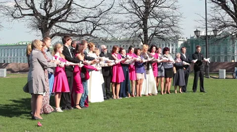 Wedding quests let pigeons go to the sky... | Stock Video | Pond5