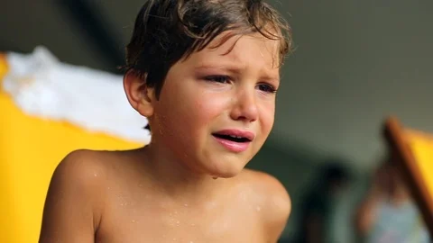 Weeping child with a sad look on his fac... | Stock Video | Pond5