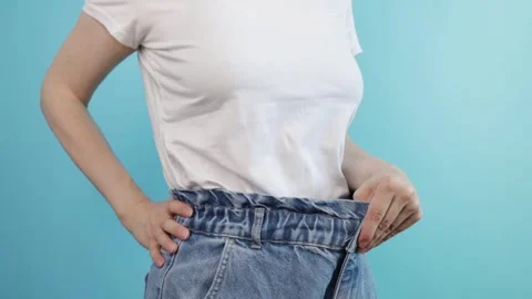 Girl Loss Pant Stock Videos – Royalty-Free HD & 4K Videos