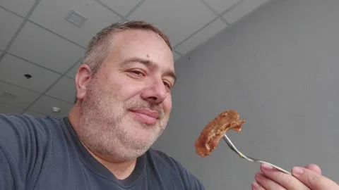 Weird Fat Man Eating Making Funny Faces | Stock Video | Pond5