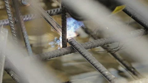 Welder is welding the steel reinforcemen... | Stock Video | Pond5