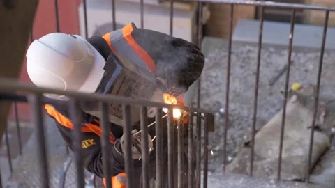 A welder welding a wrought iron fire esc... | Stock Video | Pond5