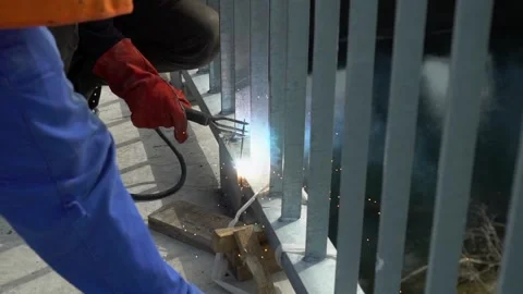 Welding work on the bridge. A profession... | Stock Video | Pond5