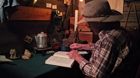 Western man reading in old bunkhouse ,vi... | Stock Video | Pond5