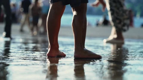 Wet Child feet and legs standing outside... | Stock Video | Pond5