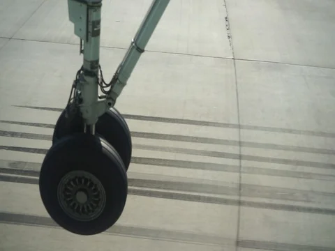 Airplane Wheel Landing Stock Footage ~ Royalty Free Stock Videos | Pond5