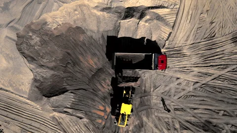 Wheel loader load sand in dump truck in ... | Stock Video | Pond5