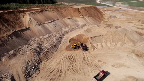 Wheel loader load sand in tipper truck i... | Stock Video | Pond5